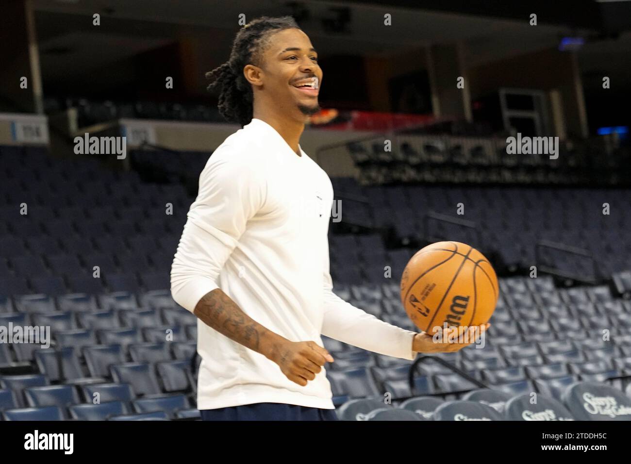 Memphis Grizzlies guard Ja Morant smiles on the court during the NBA ...