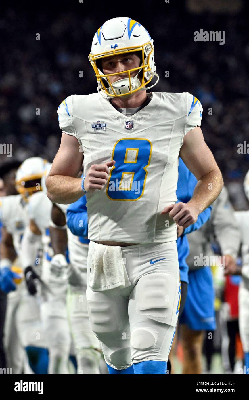 Los Angeles Chargers quarterback Max Duggan (8) runs off the field for ...