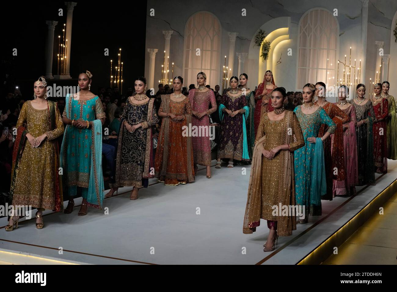 A model presents a creation from designer Harris Shakeel during a ...