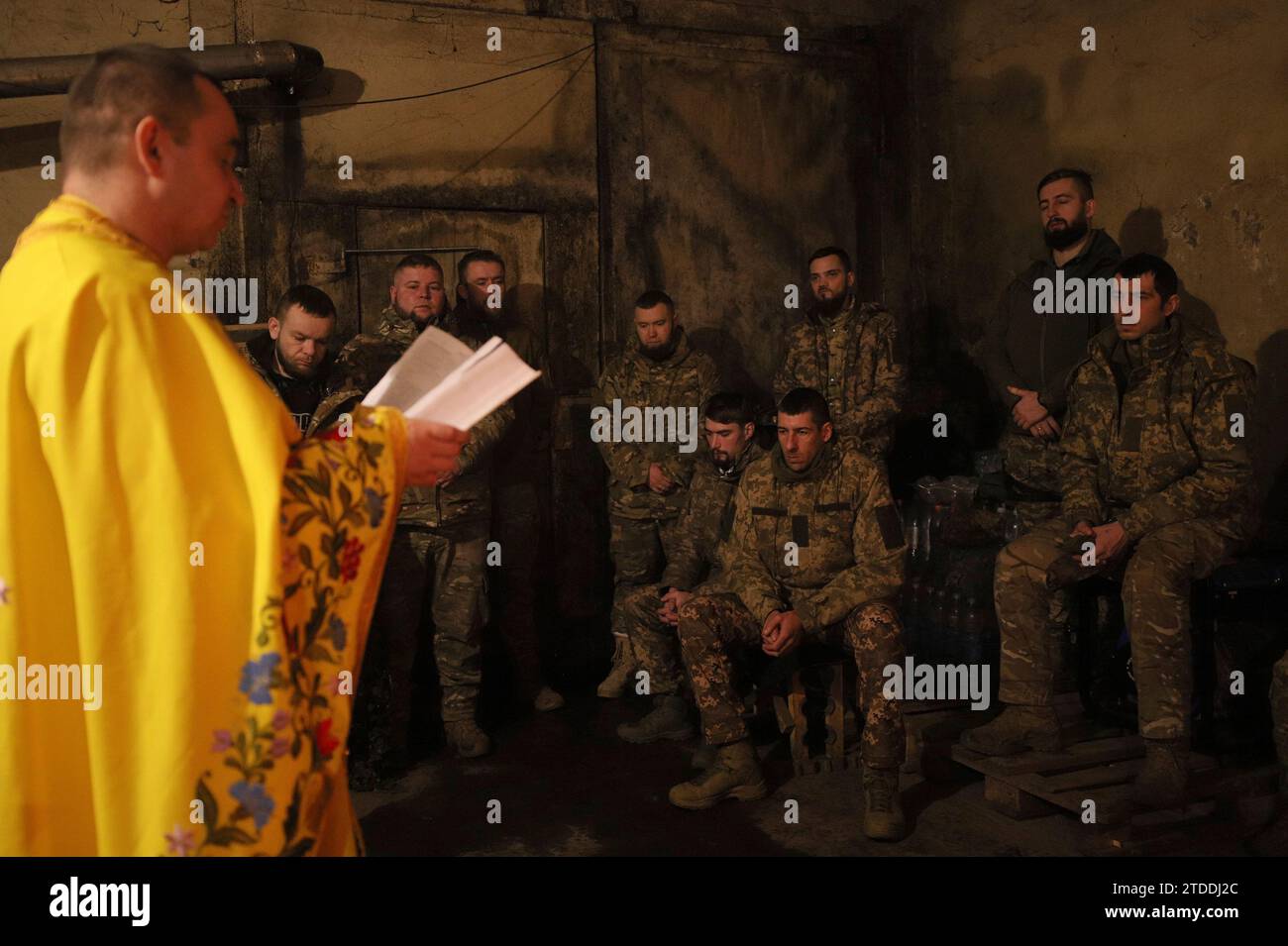 Chaplain Ivan of the Orthodox Church of Ukraine reads a prayer for ...