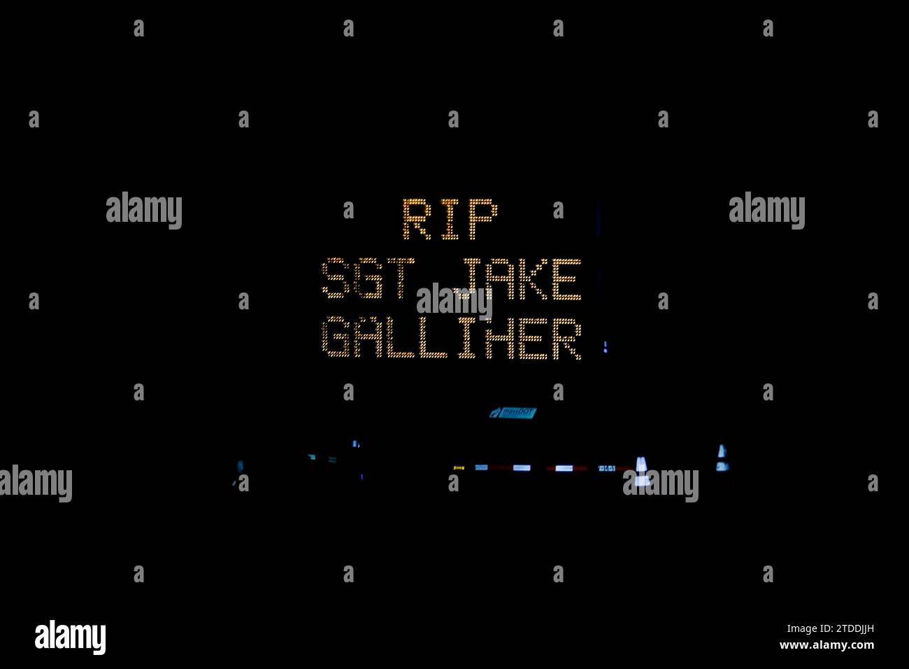 On Massachusetts Turnpike, signs flash between "RIP SGT JAKE GALLIHER ...