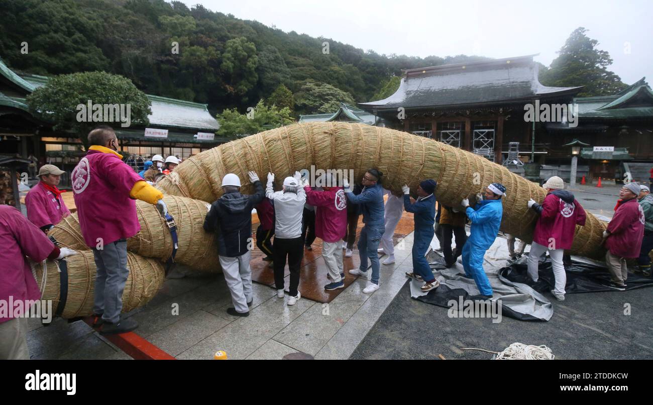 People make a largest sacred straw rope during an annual event at ...
