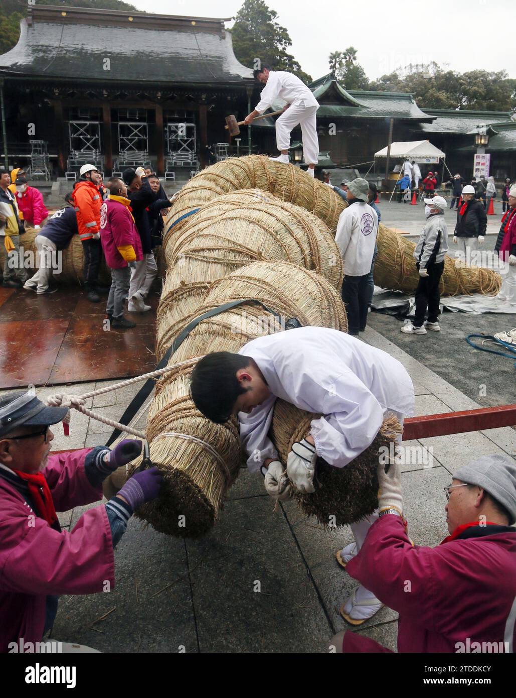 People make a largest sacred straw rope during an annual event at ...