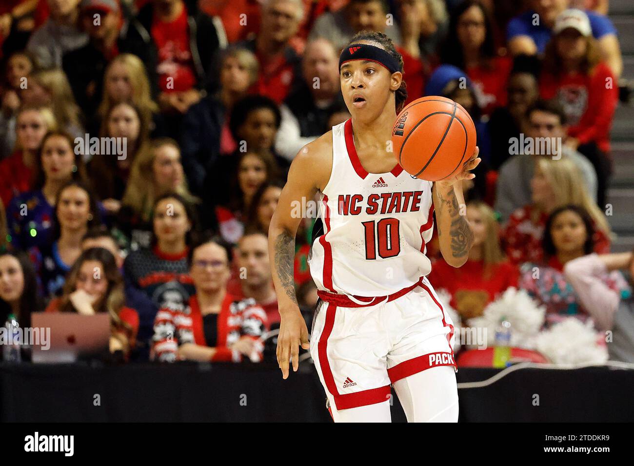 North Carolina State's Aziaha James (10) brings the ball up the court ...