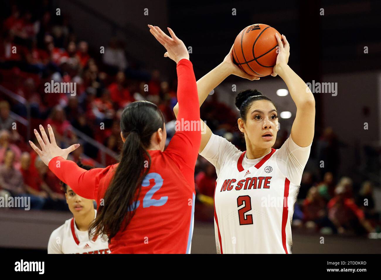 North Carolina State's Mimi Collins (2) looks to pass the ball around ...