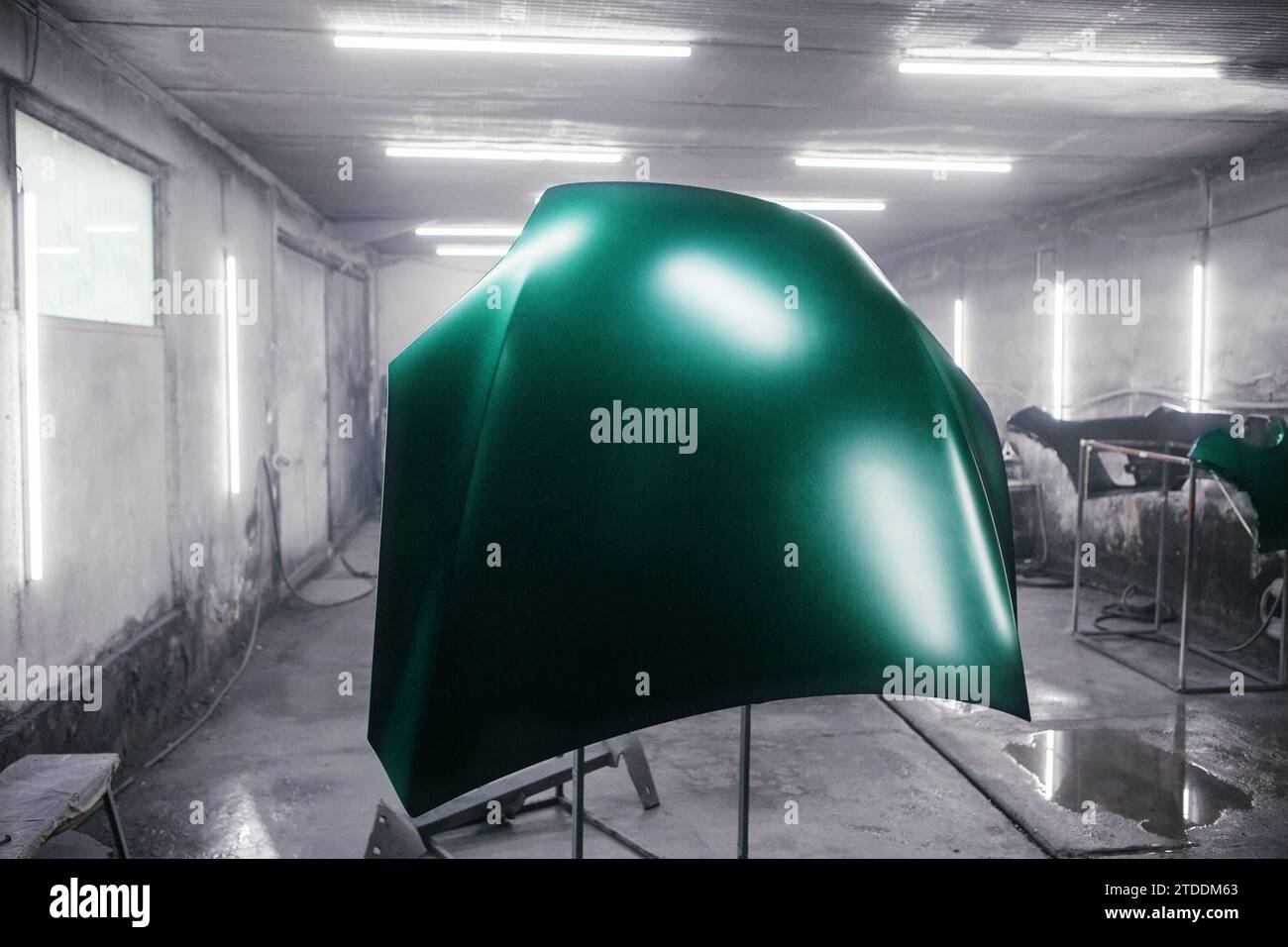 Restoration painting of car in the paint chamber service. Painted parts ...