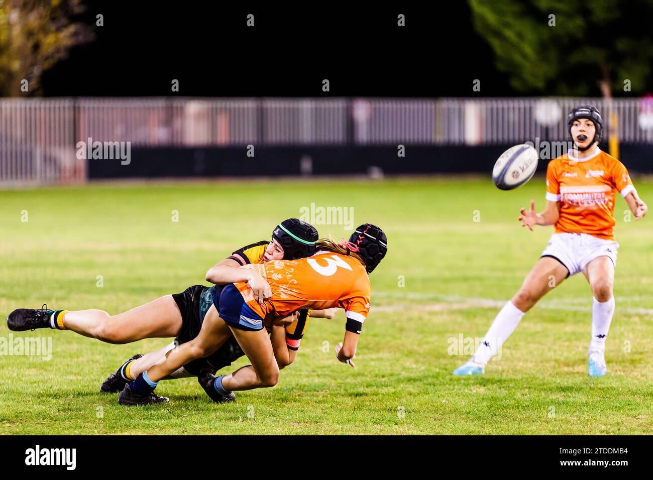 Women making a tackle at a rugby match Stock Photo - Alamy