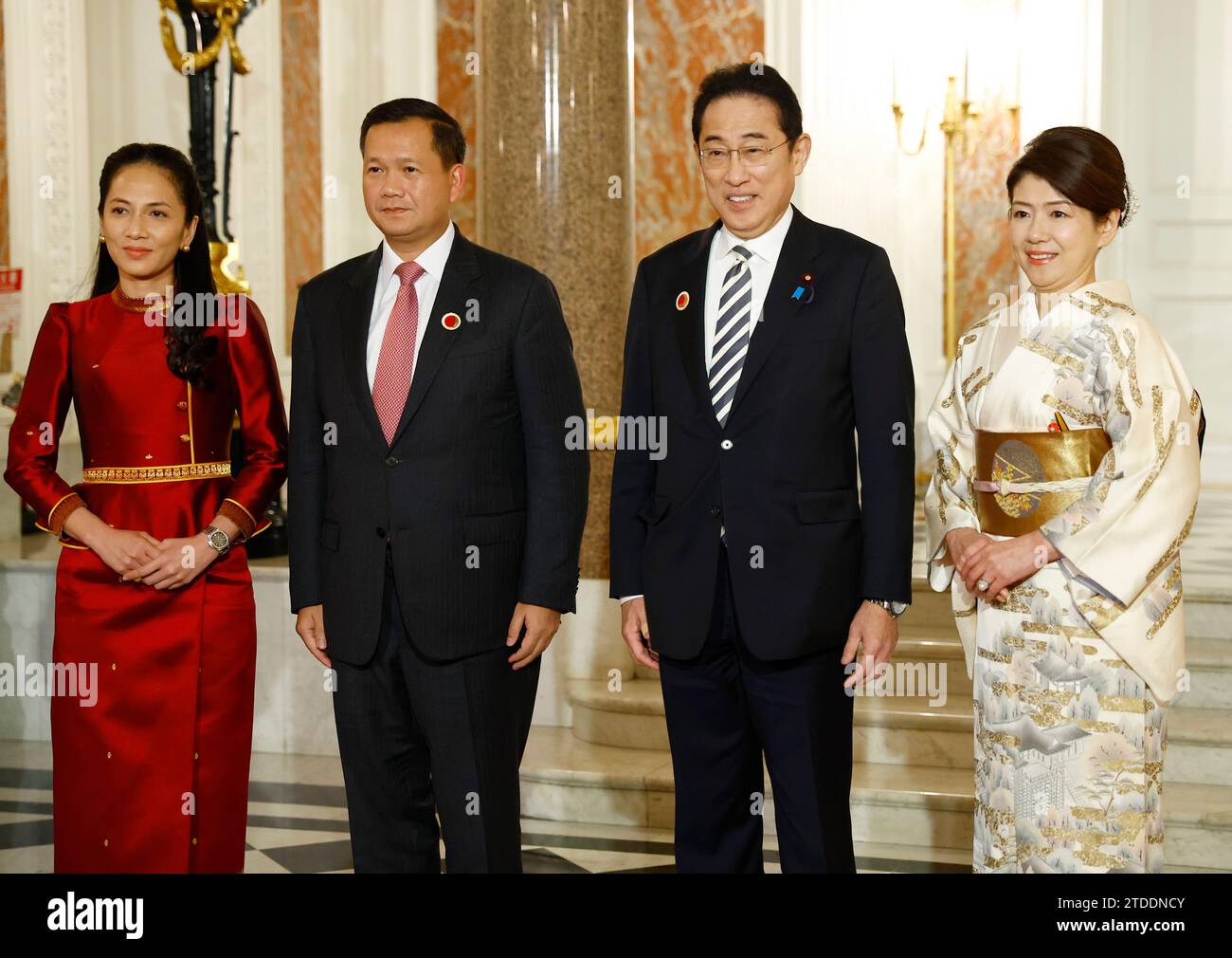 Japan's Prime Minister Fumio Kishida, centre right, and his wife Yuko Kishida, right, pose with ...
