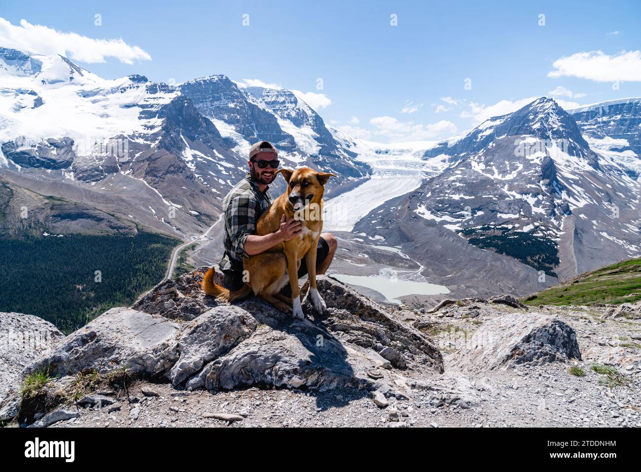 Owner Poses For Photo With Handsome Dog Stock Photo - Alamy