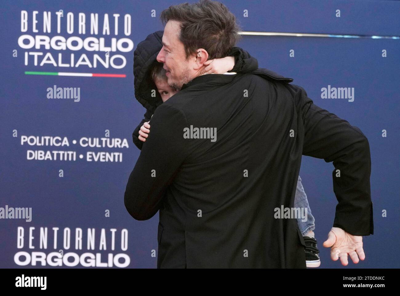 Tesla and SpaceX's CEO Elon Musk arrives withg one of his children at ...