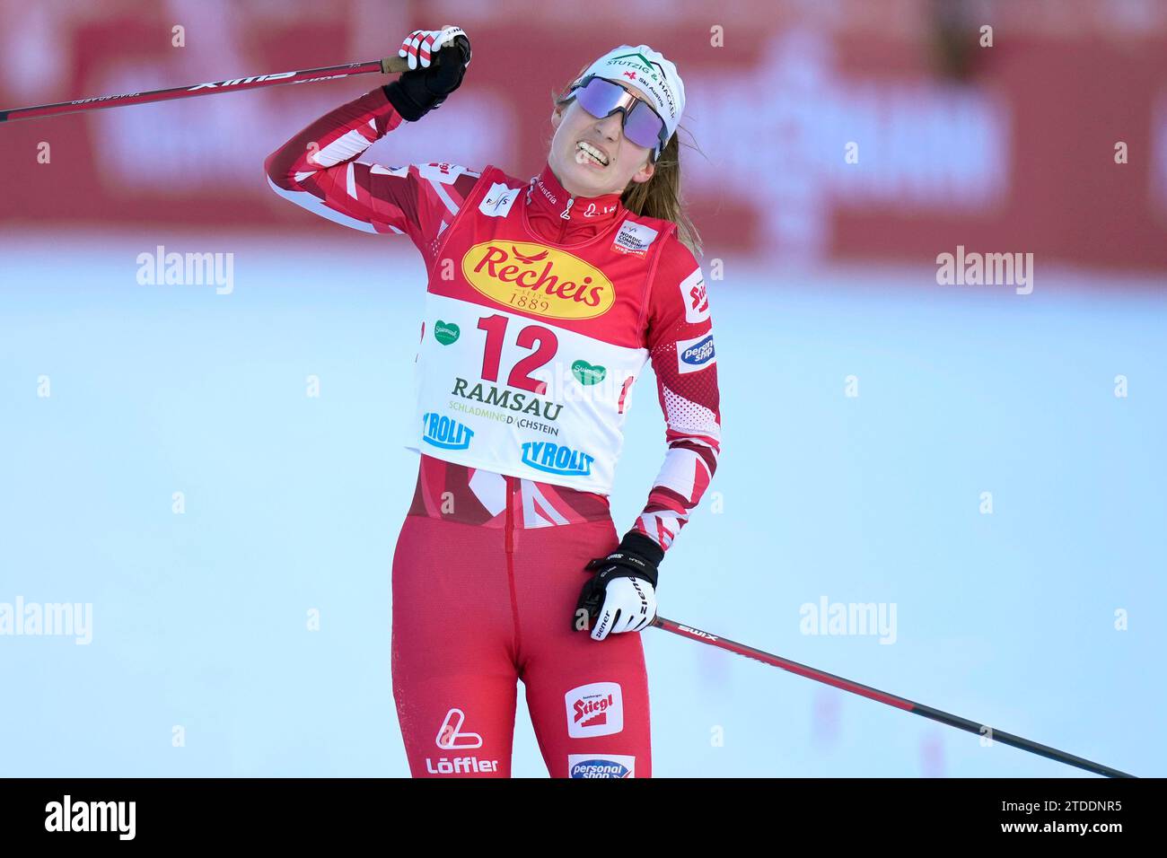 Lisa Hirner of Austria celebrates as she crosses the finish line at the ...