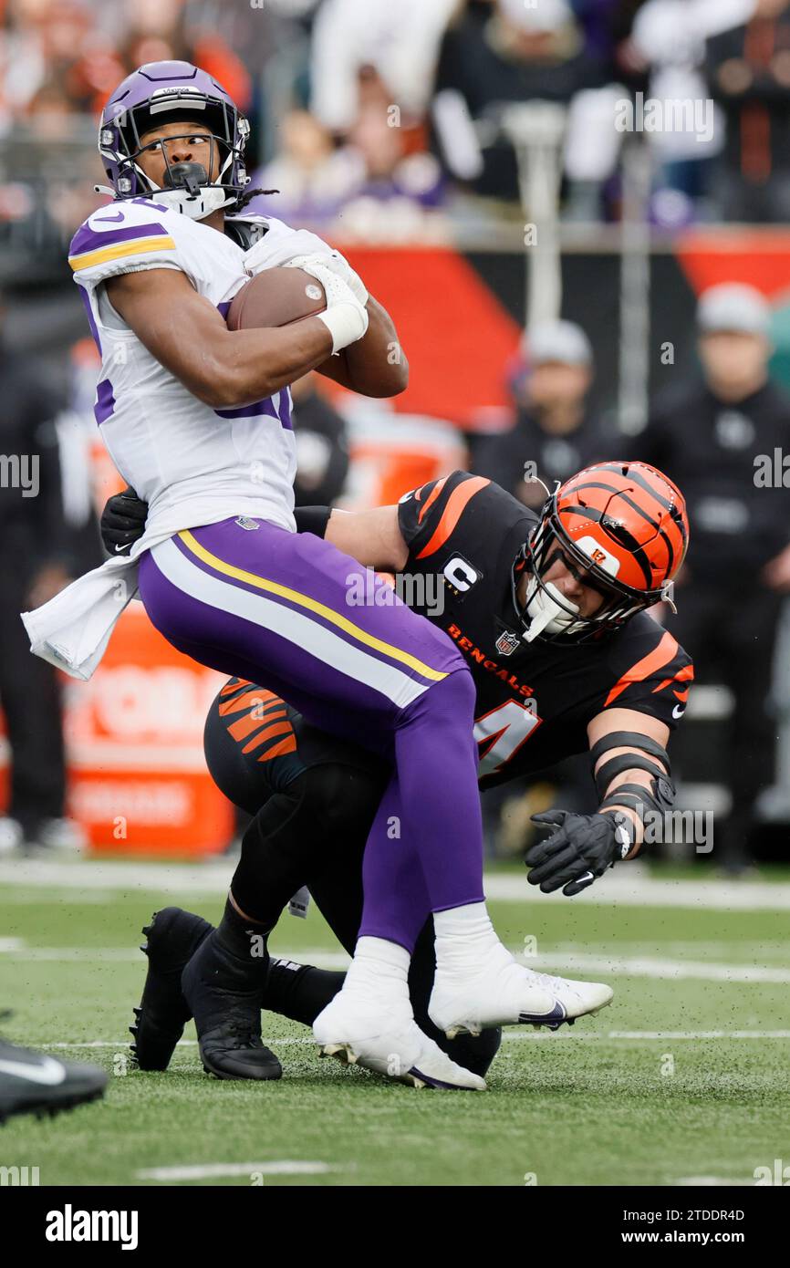 Minnesota Vikings running back Ty Chandler (32) is tackled by ...