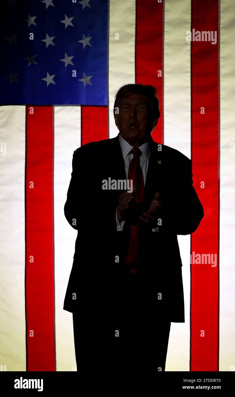Former President Donald Trump takes the stage at a campaign rally ...