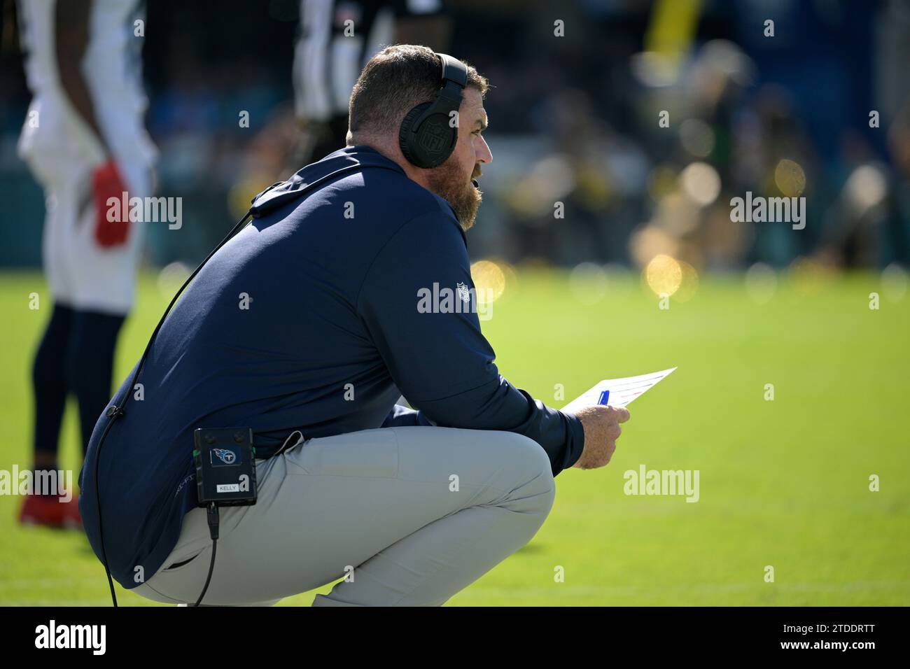 Tennessee Titans offensive coordinator Tim Kelly works from the ...
