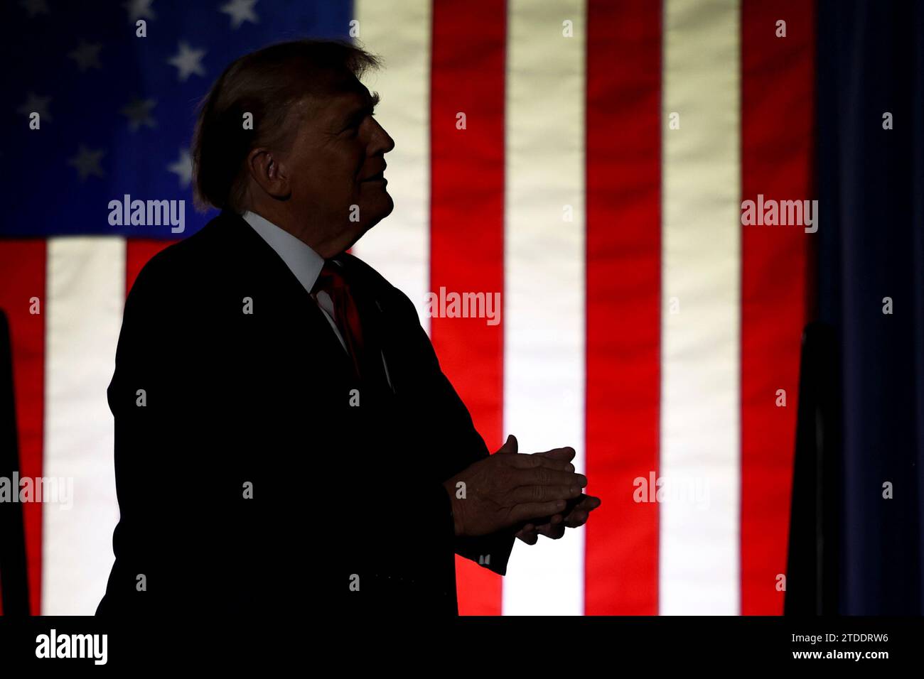 Former President Donald Trump takes the stage at a campaign rally ...