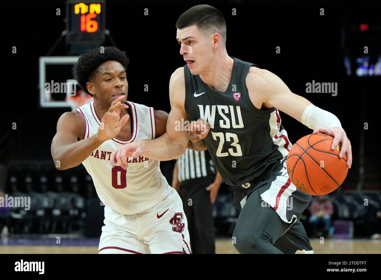 Washington State forward Andrej Jakimovski (23) drives on Santa Clara ...