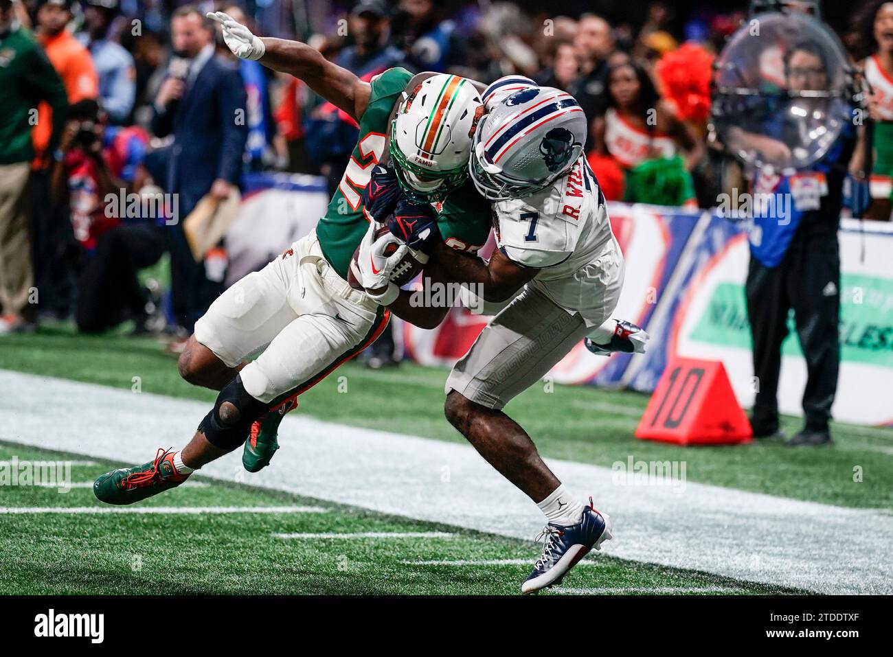 Florida A&M running back Lelan Wilhoite (25) is hit by Howard defensive ...