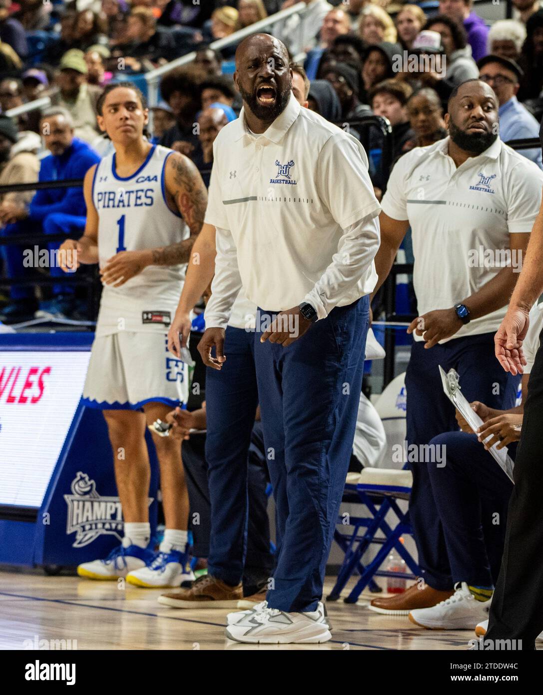 Hampton head coach Edward Joyner yells out to his team during the first ...