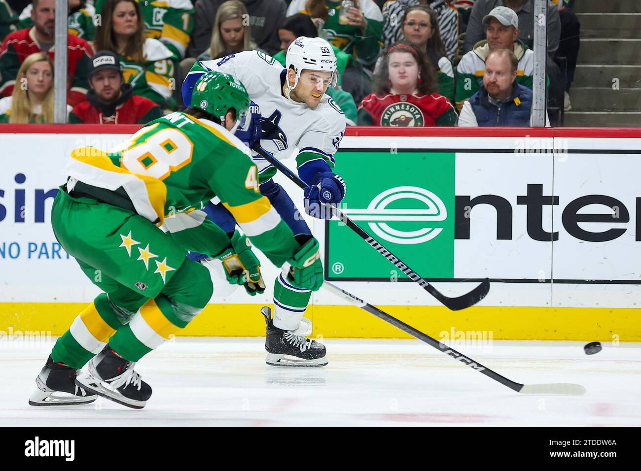 Vancouver Canucks center Teddy Blueger (53) shoots while Minnesota Wild ...