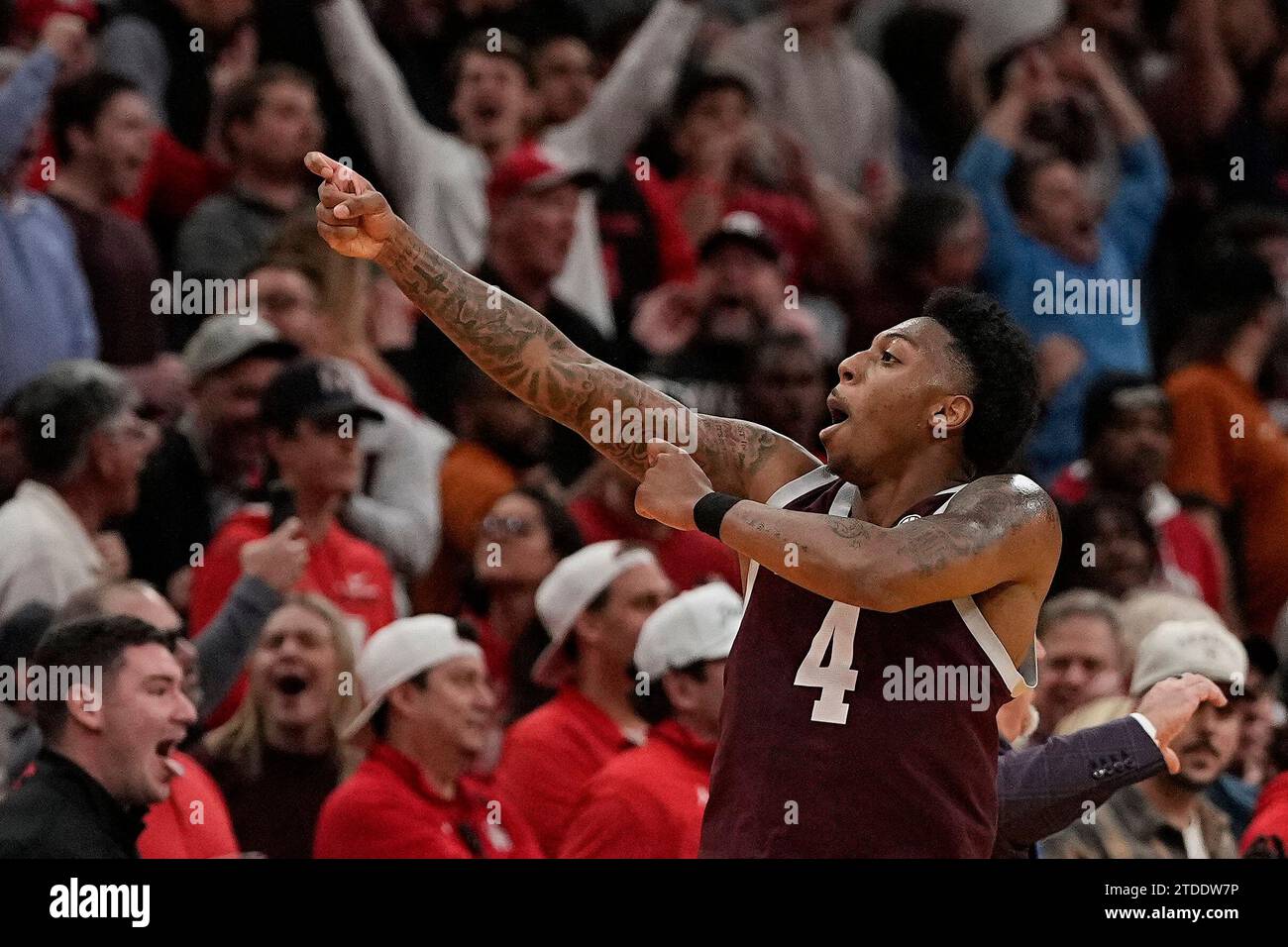 Texas A&M guard Wade Taylor IV celebrates after hitting a three pointer ...