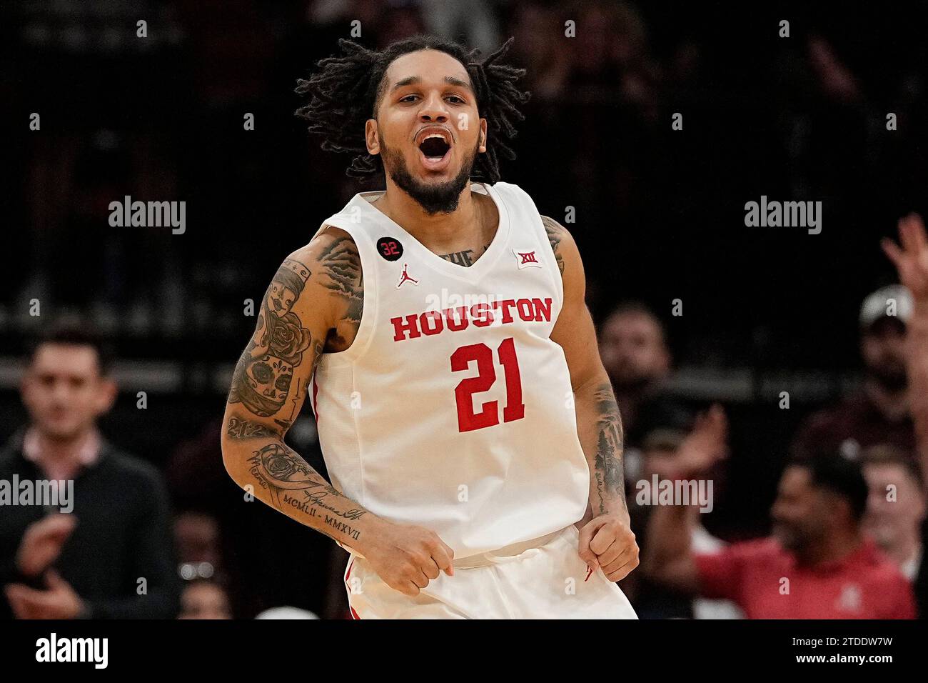 Houston guard Emanuel Sharp celebrates after a three pointer during the ...
