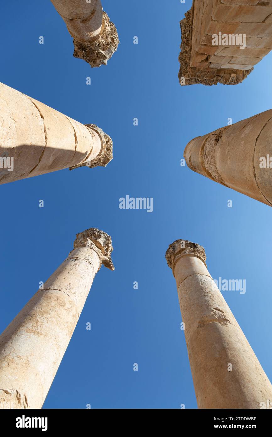 Blue sky and roman columns viewed from right under, Jerash Stock Photo ...