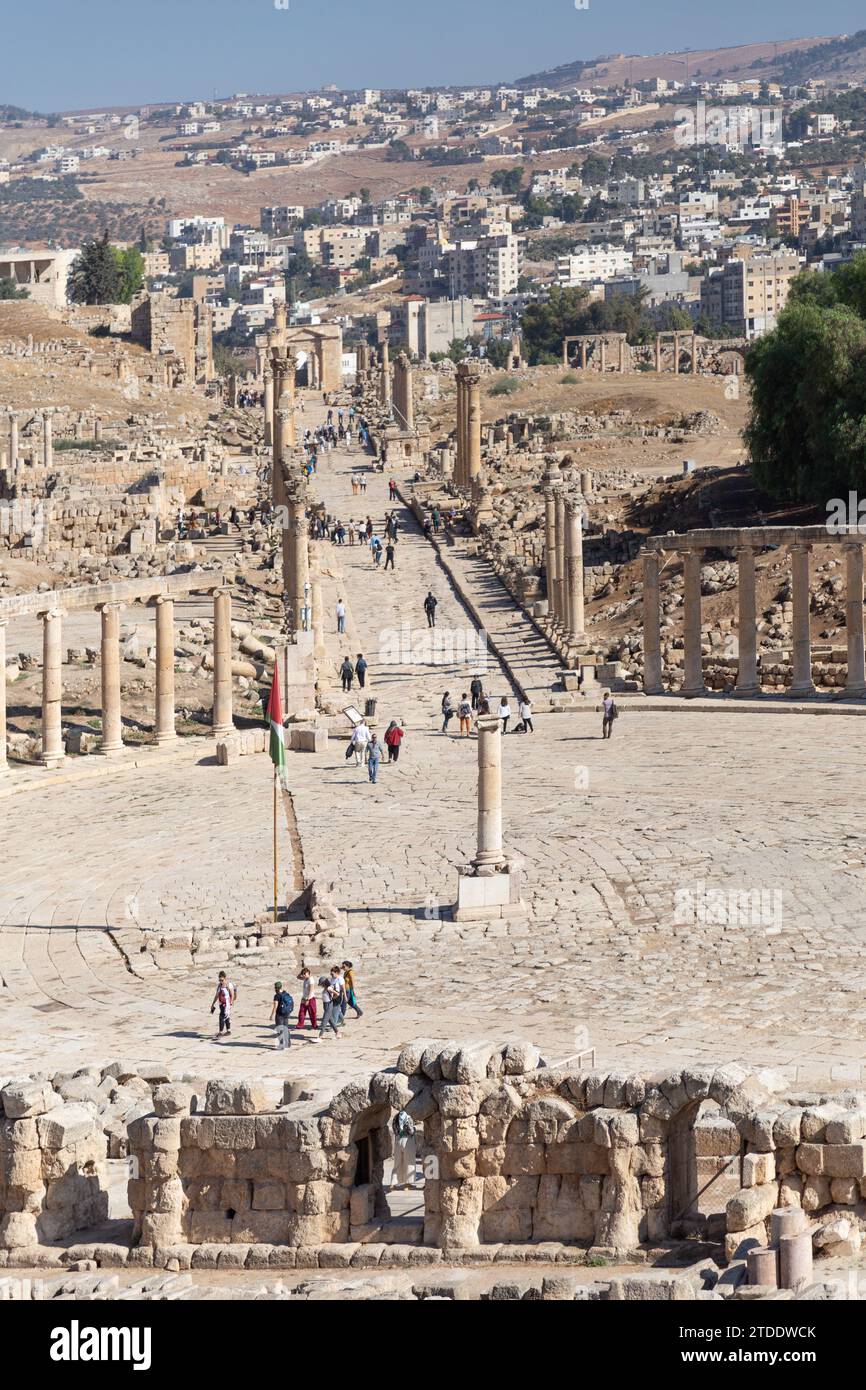 Tourists visiting the Jerash ruins during sunny day, Jordan Stock Photo ...