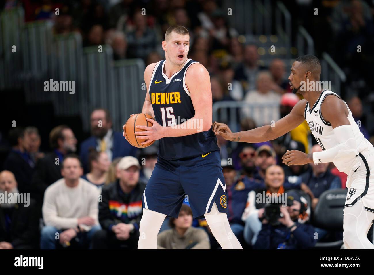 Denver Nuggets center Nikola Jokic (15) and Brooklyn Nets forward Harry ...