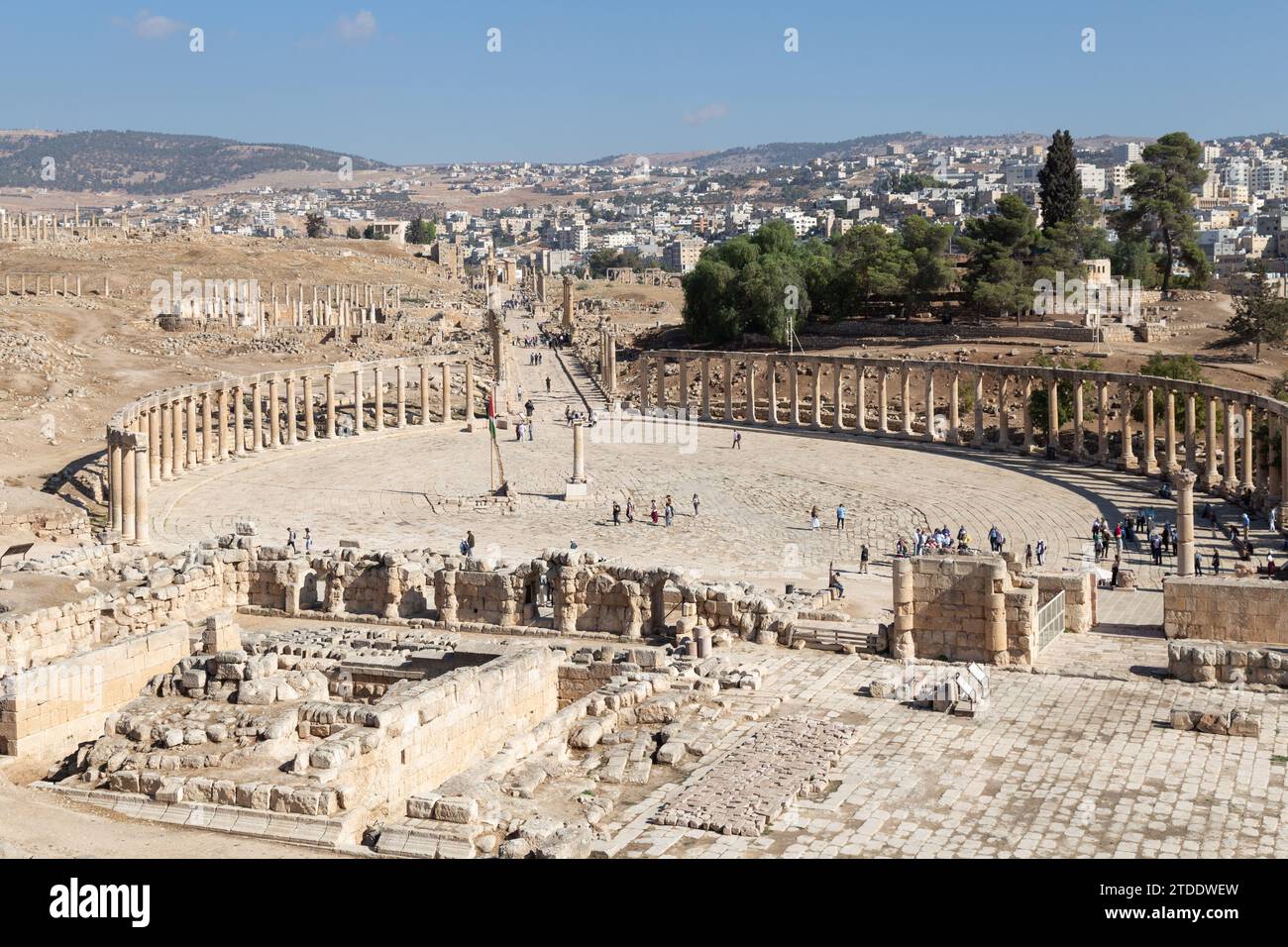 Tourists visiting the Jerash ruins during sunny day, Jordan Stock Photo ...