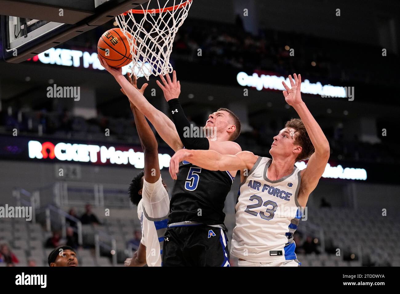 Texas-Arlington guard Brandyn Talbot (5) goes up to shoot as Air Force ...