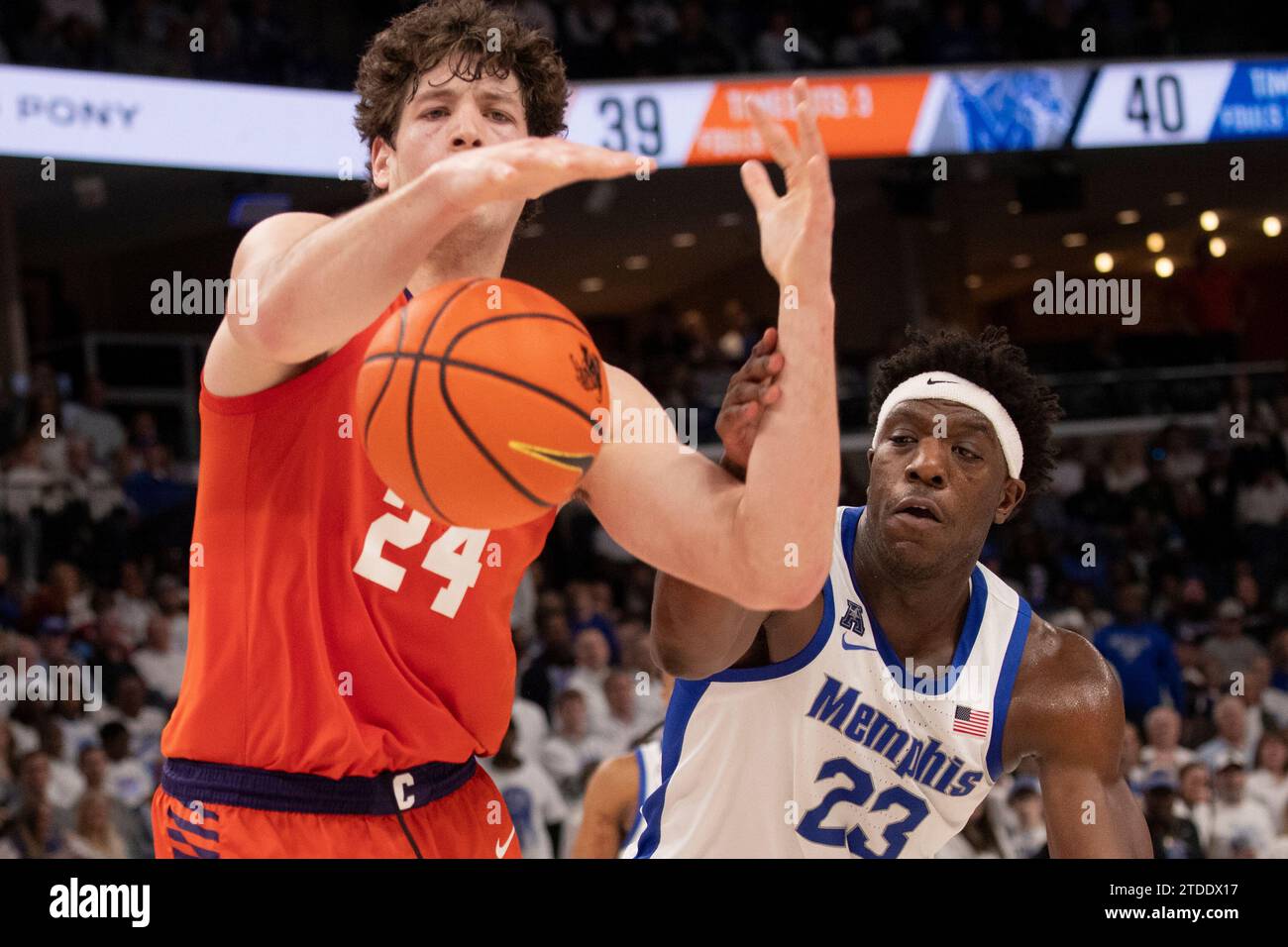Clemson center PJ Hall (24) is grabbed by Memphis forward Malcom ...
