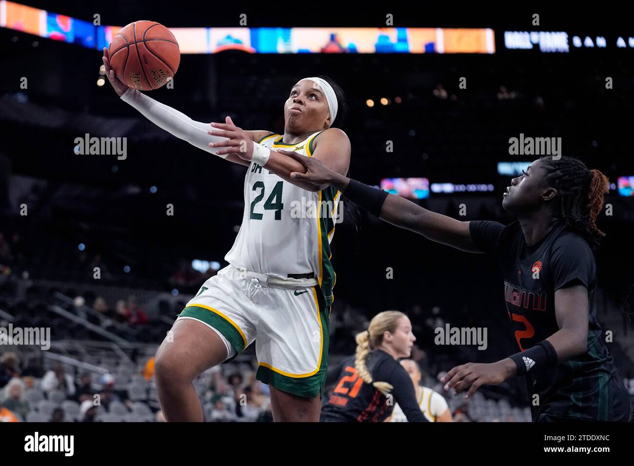 Baylor guard Sarah Andrews (24) is fouled by Miami guard Ja'Leah ...