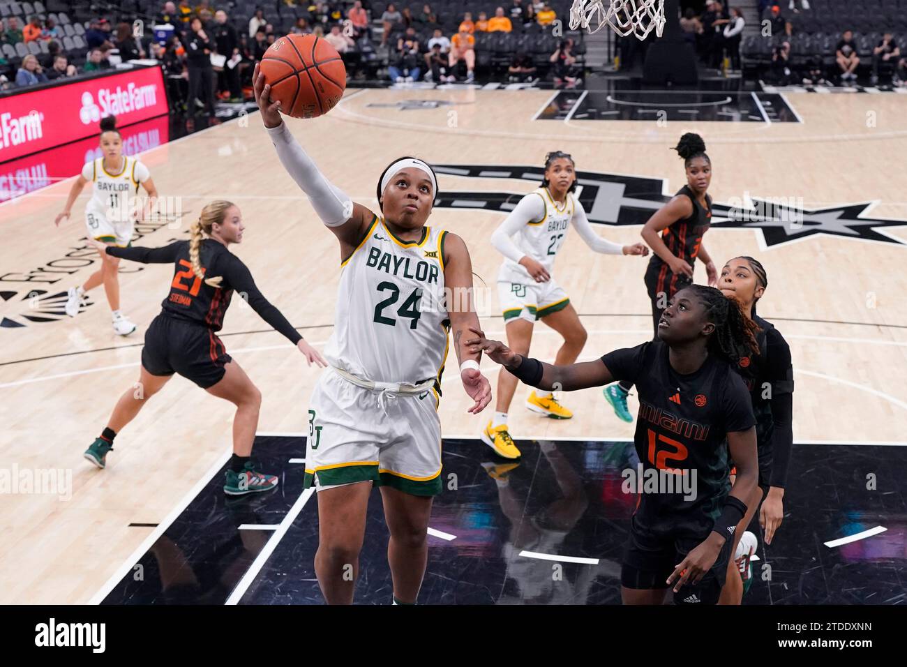 Baylor guard Sarah Andrews (24) drives to the basket against Miami ...
