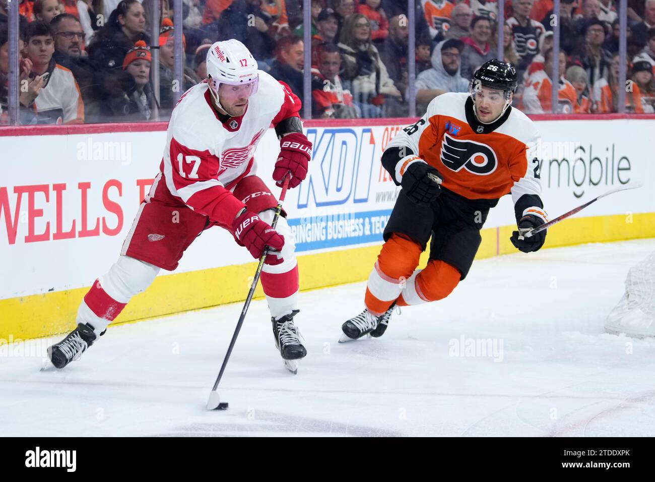 Detroit Red Wings' Daniel Sprong, left, gets past Philadelphia Flyers ...