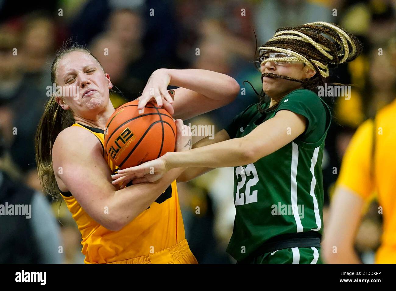 Iowa center Sharon Goodman, left, fights for a rebound with Cleveland ...