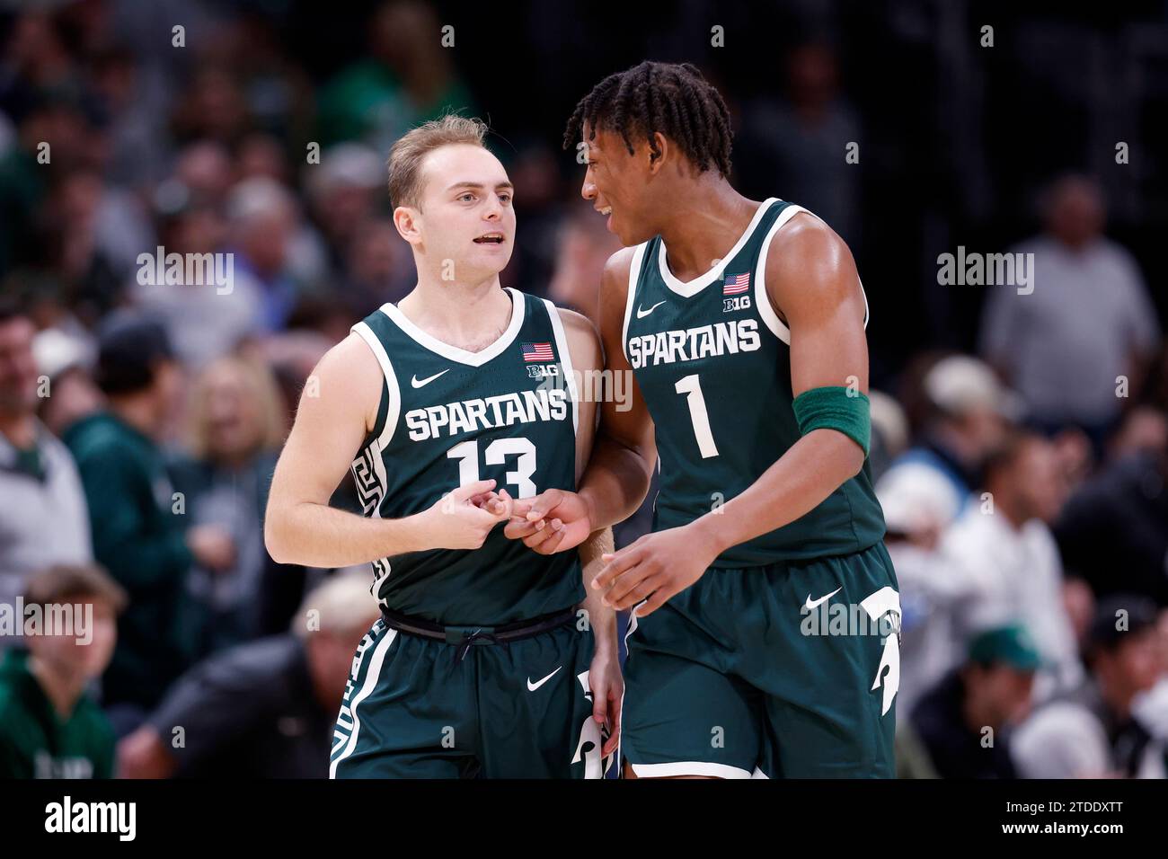 Michigan State guard Steven Izzo, left, and guard Jeremy Fears Jr. (1 ...