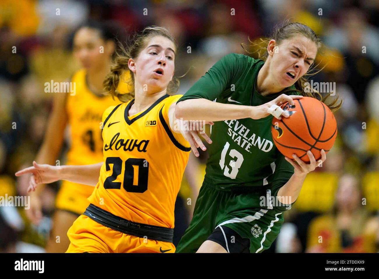 Iowa guard Kate Martin (20) tries to steal the ball from Cleveland ...