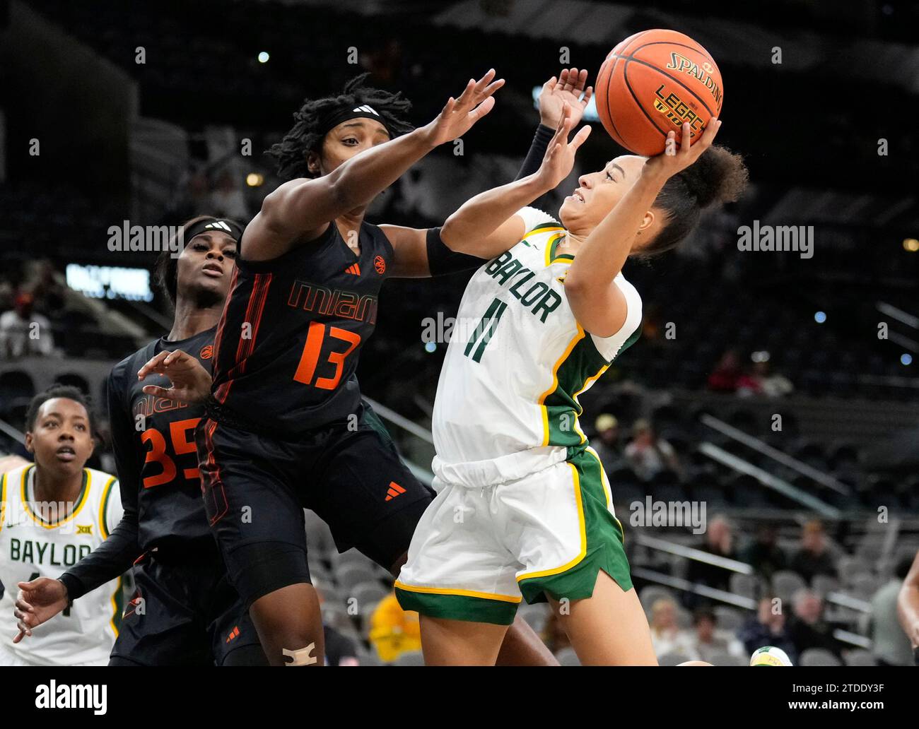 Baylor guard Jada Walker (11) looks to score a basket and is fouled by ...
