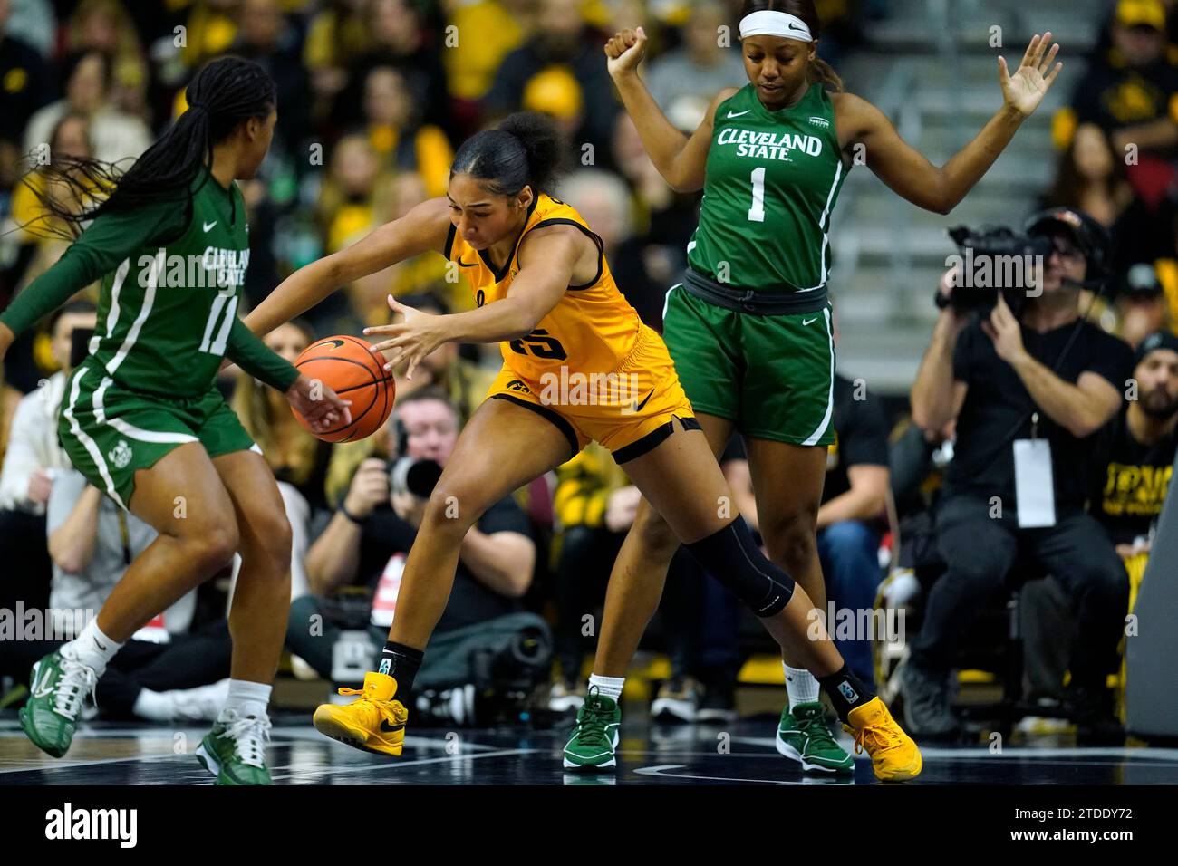 Iowa forward Hannah Stuelke (45) runs down a loose ball between ...