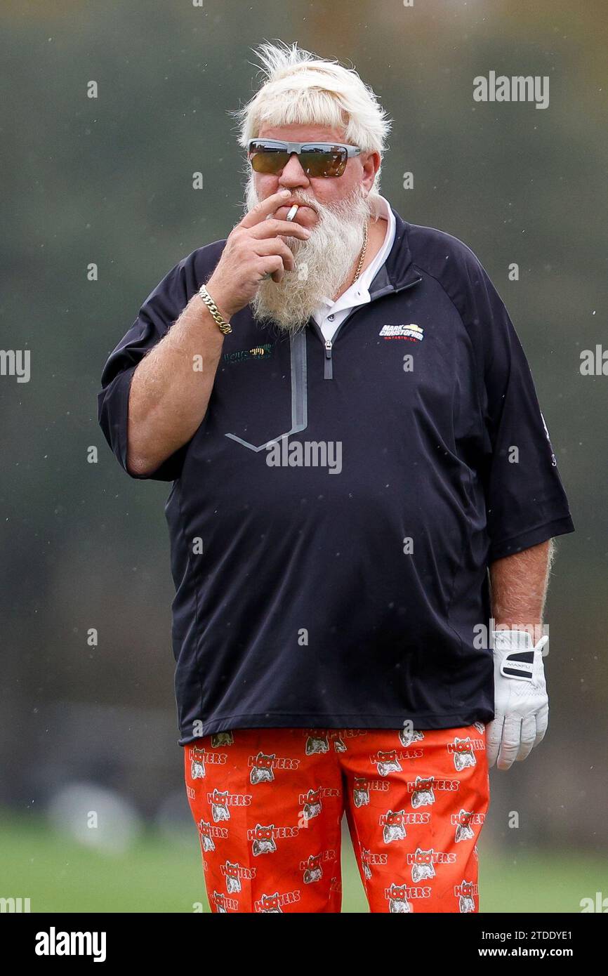 December 16, 2023: John Daly smoking a cigarette during Round One of the PNC Championship golf ...