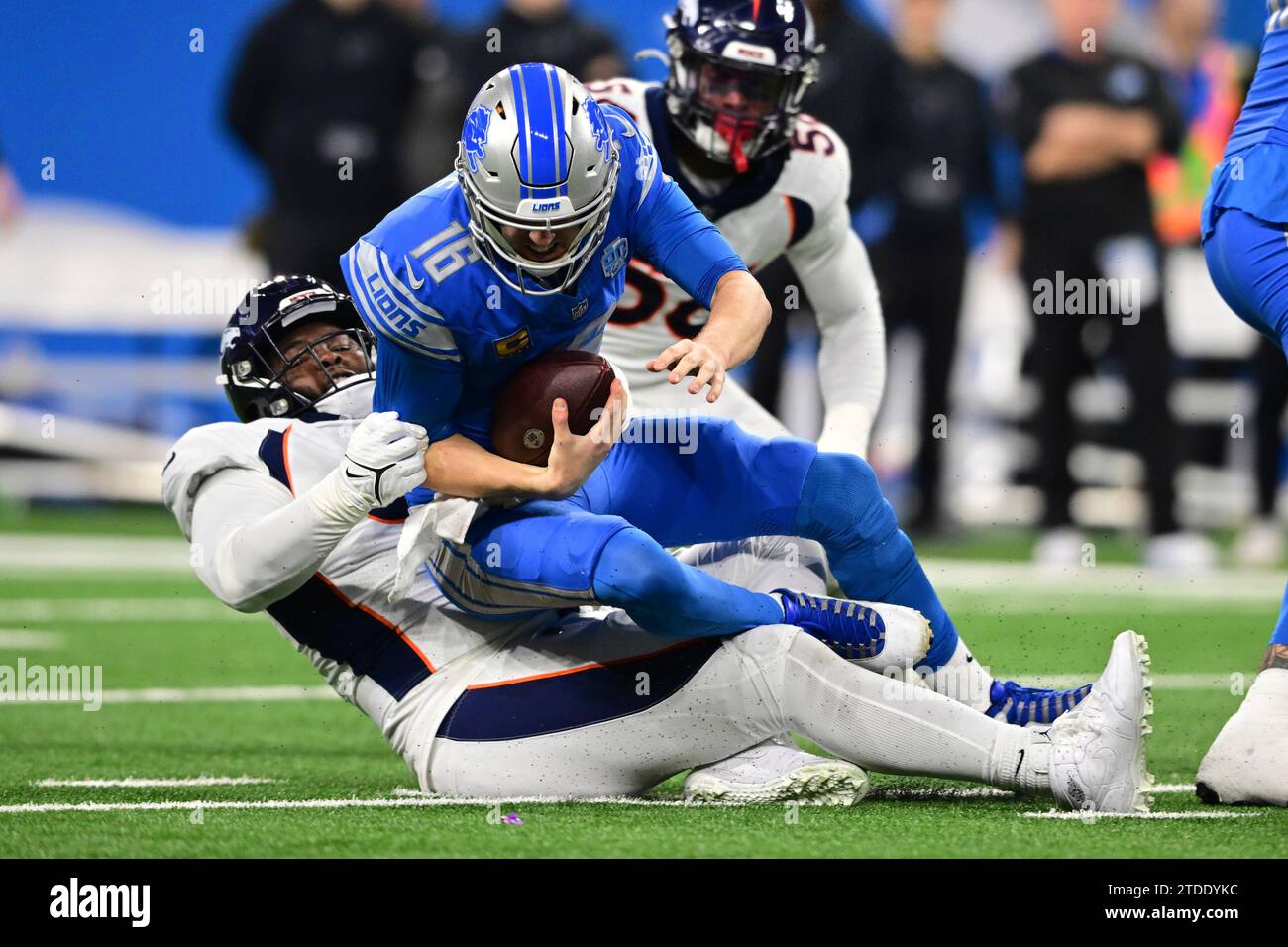 Detroit Lions quarterback Jared Goff (16) is sacked by Denver Broncos ...