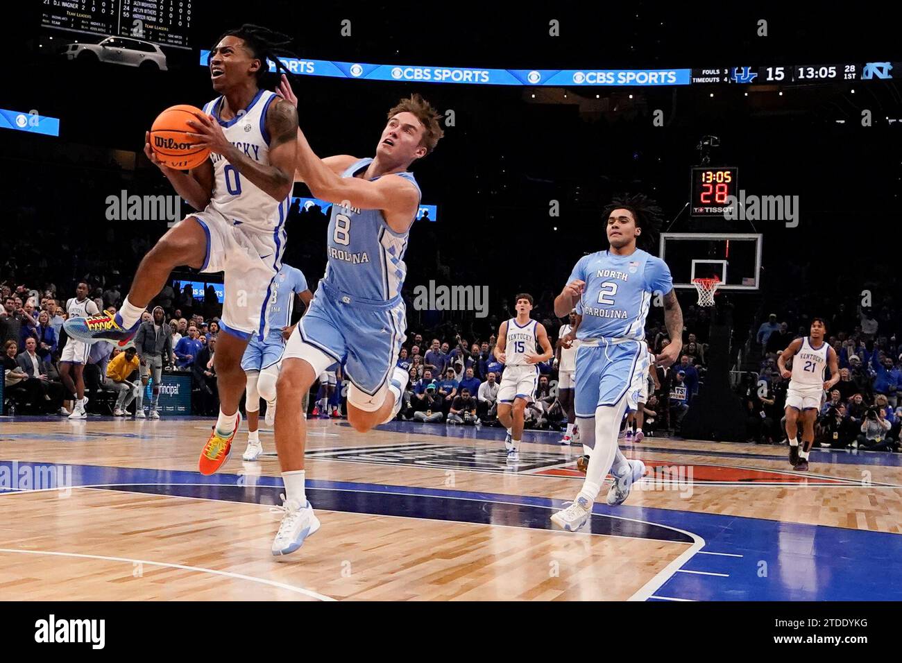 Kentucky guard Rob Dillingham (0) attempts to shoot as North Carolina ...