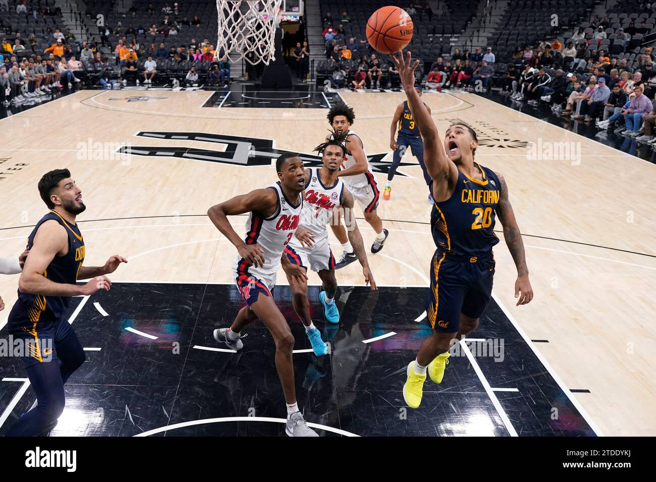 California guard Jaylon Tyson (20) scores past Mississippi forward ...