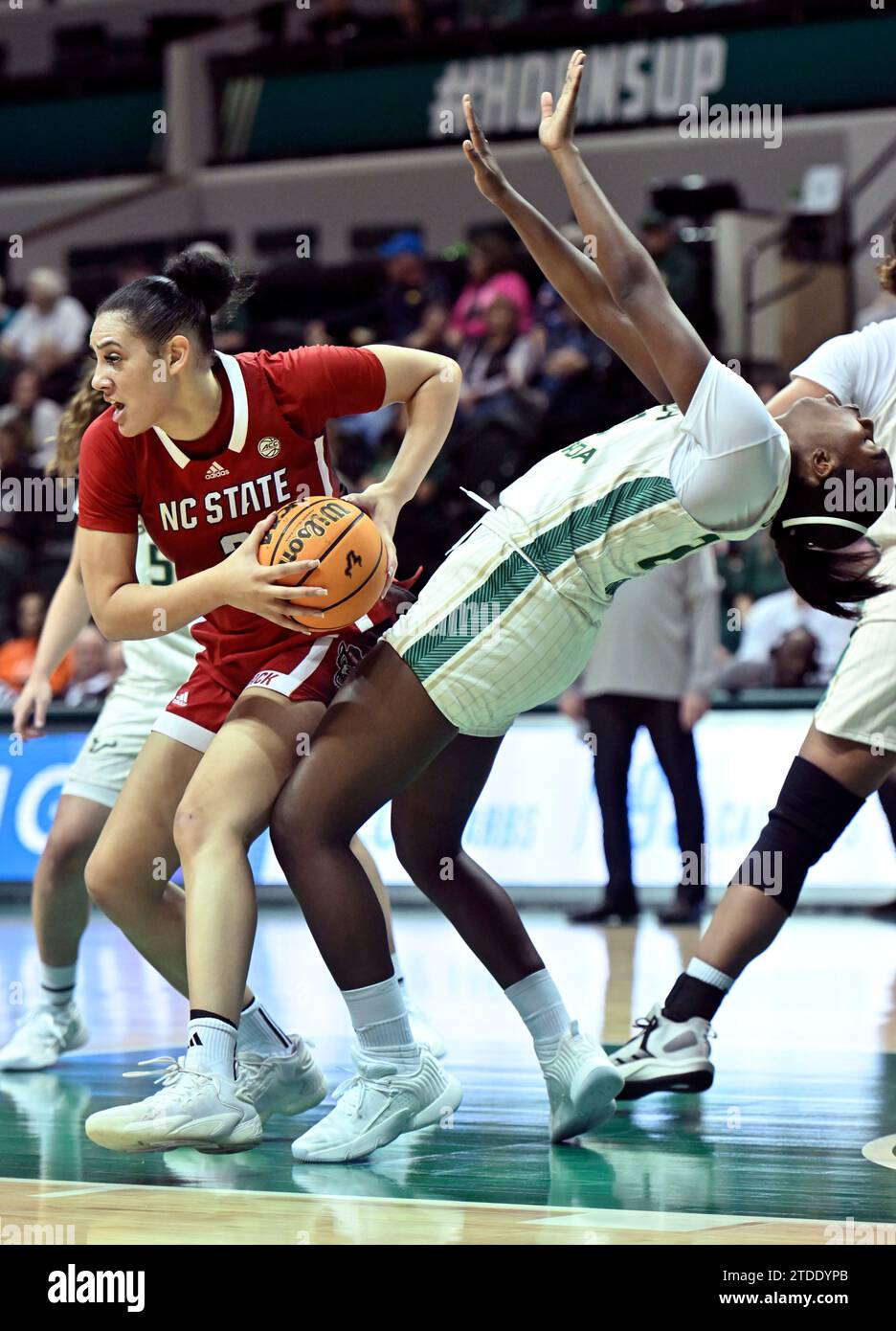 North Carolina State forward Mimi Collins, left, works against South ...