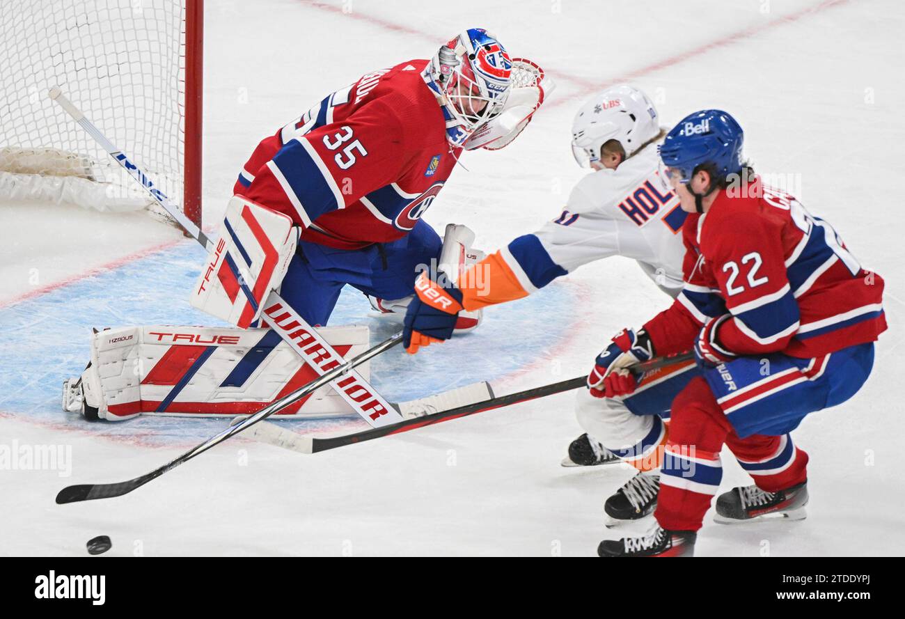 New York Islanders' Simon Holmstrom (10) skates in on Montreal ...