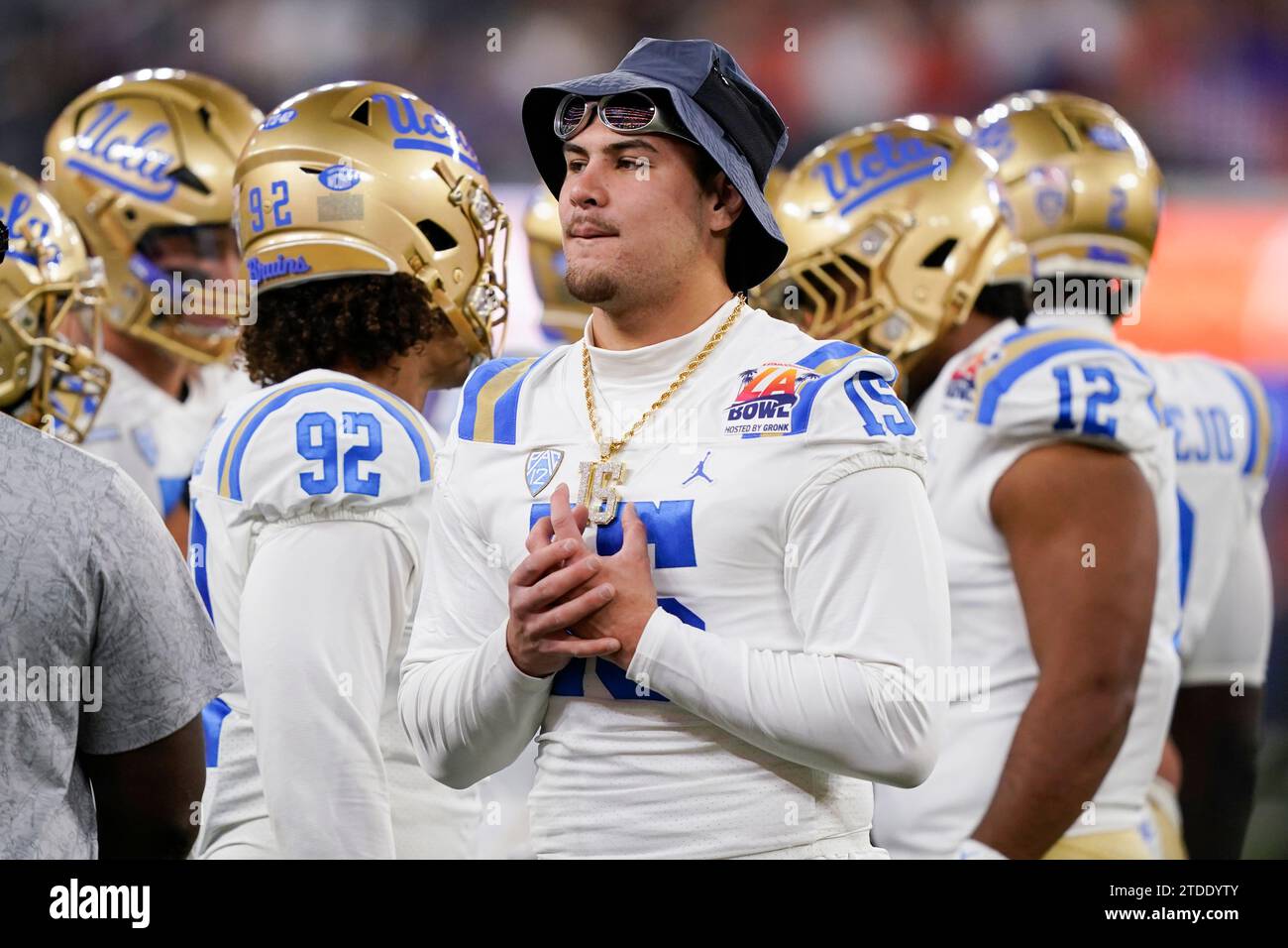 UCLA defensive lineman Laiatu Latu (15) stands on the sideline during ...