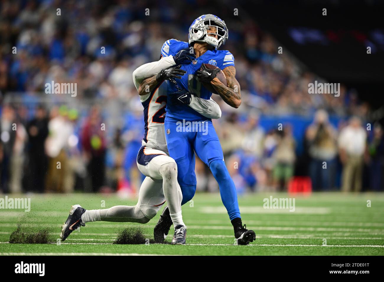 Detroit Lions wide receiver Josh Reynolds (8) is tackled by Denver ...