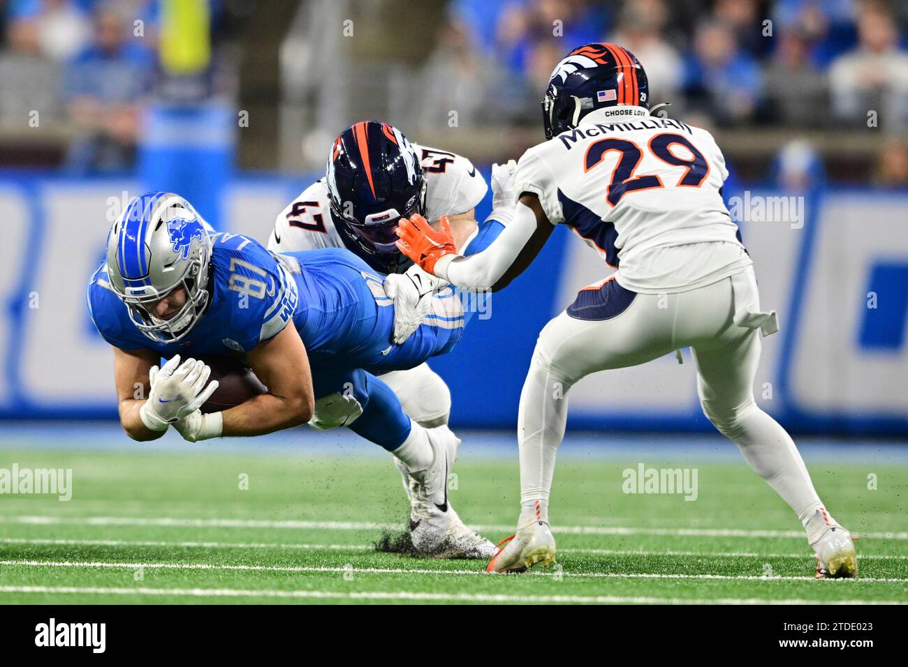 Detroit Lions tight end Sam LaPorta (87) is tackled by Denver Broncos ...