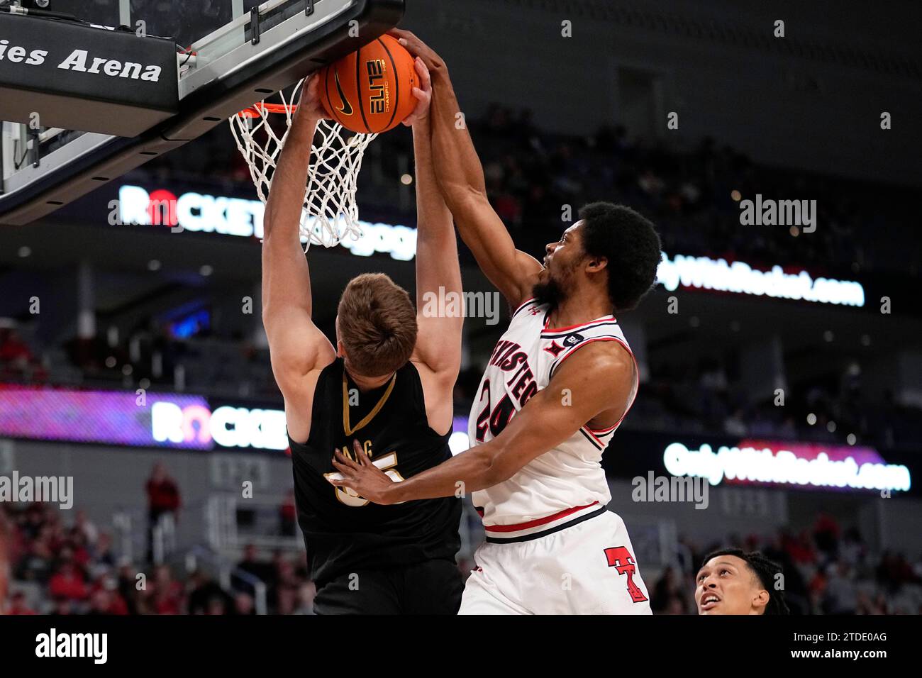 Vanderbilt forward Carter Lang, left, has his shot blocked by Texas ...