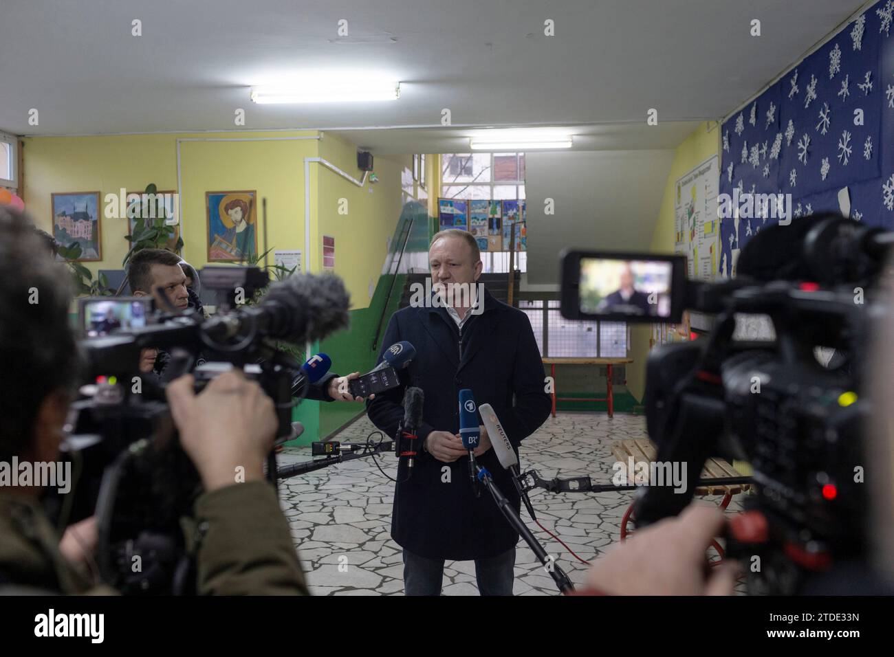 Dragan Djilas, center, the main opposition coalition leader, talks to ...